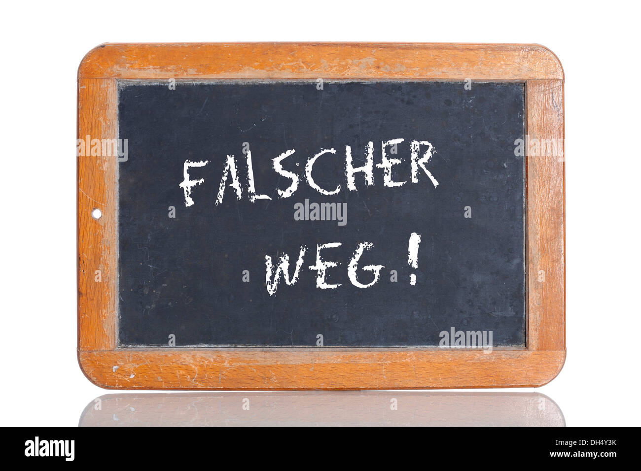 Old school blackboard with the term FALSCHER WEG, German for wrong way ...