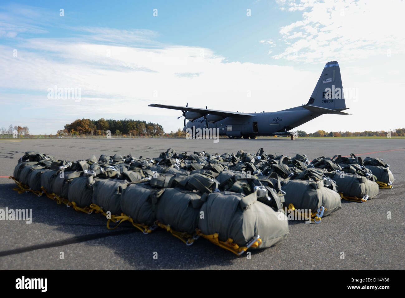T-11 parachutes lie ready to be issued to paratroopers, assigned to ...