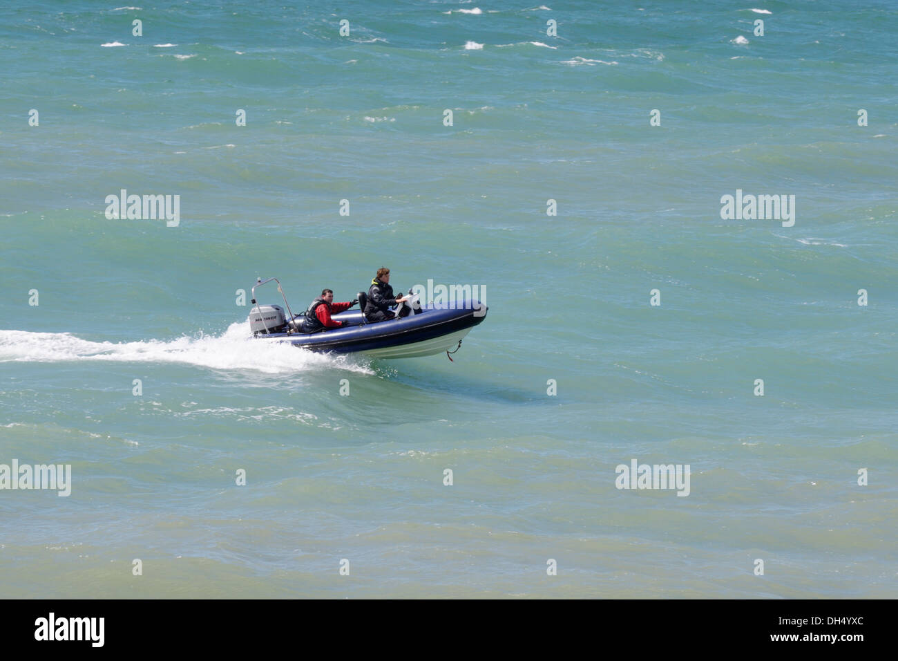 Inflatable dinghy outboard motor hi-res stock photography and images ...