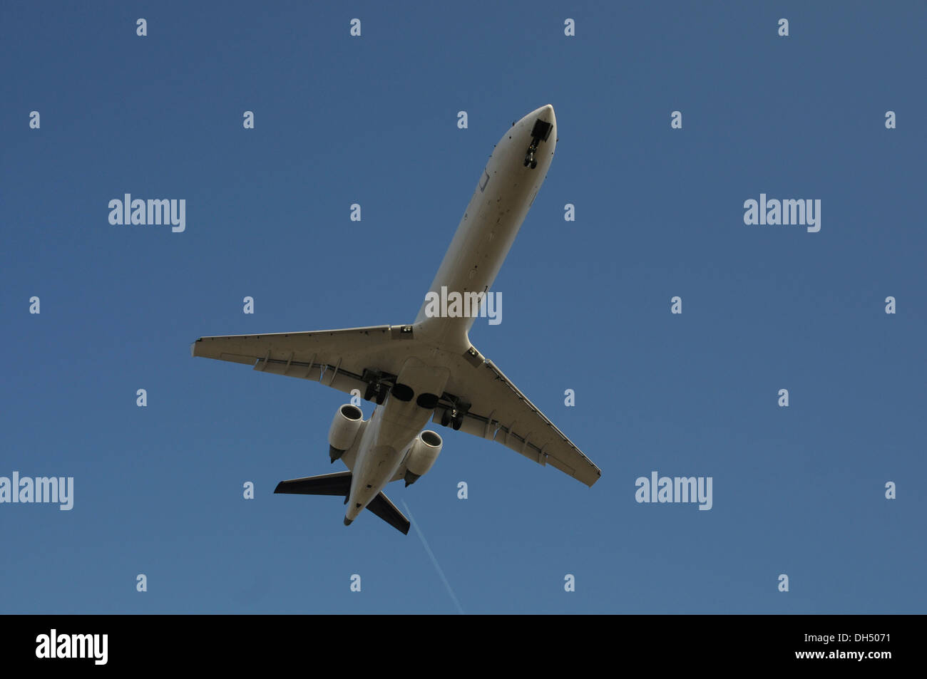 Passenger aircraft during landing approach, from below Stock Photo - Alamy