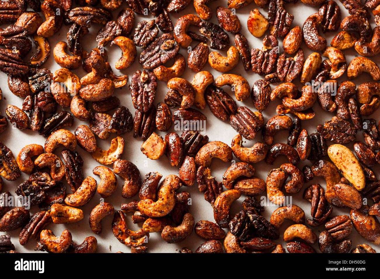 Brown Candied Caramelized Nuts with Cinnamon and Spices Stock Photo - Alamy