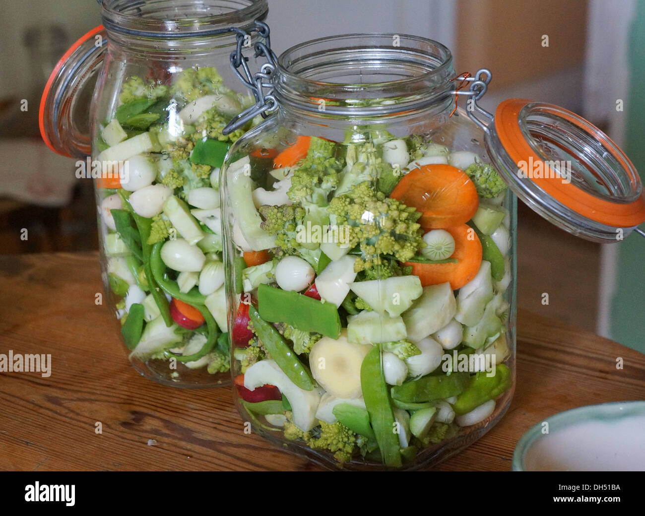 Fermenting vegetables in glass jar,prepare Stock Photo - Alamy
