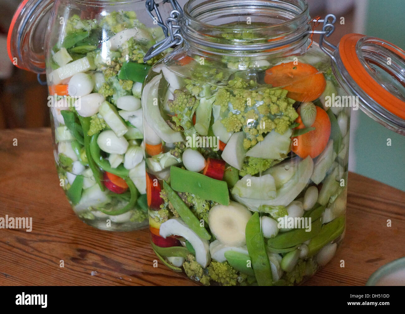 Fermenting vegetables in glass jar,prepare Stock Photo - Alamy
