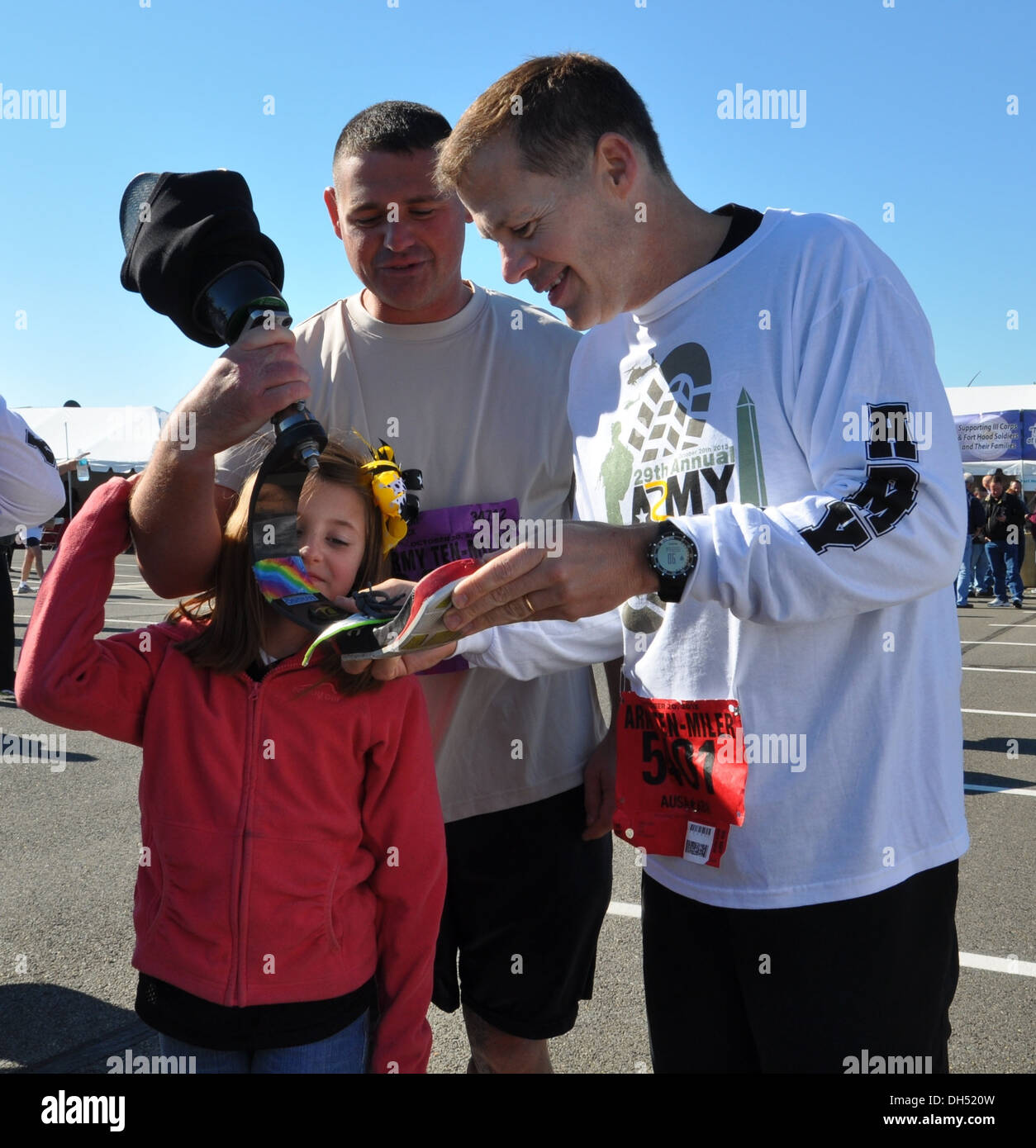 Staff Sgt. Daniel Burgess and his daughter explain his custom running ...