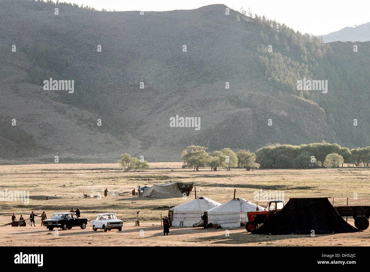 Mongolian nomads move camp with their traditional yurts or gers, modern ...