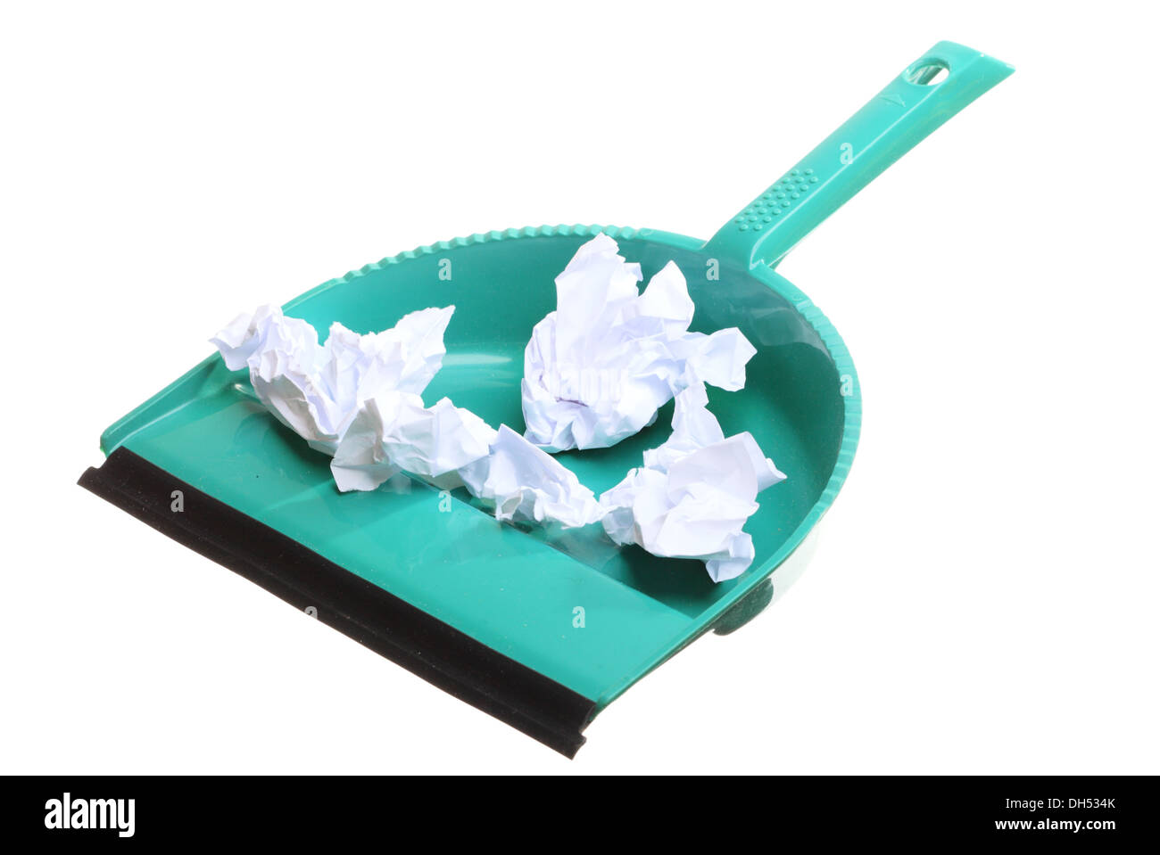 Green dustpan for house work with garbage papers isolated on white ...