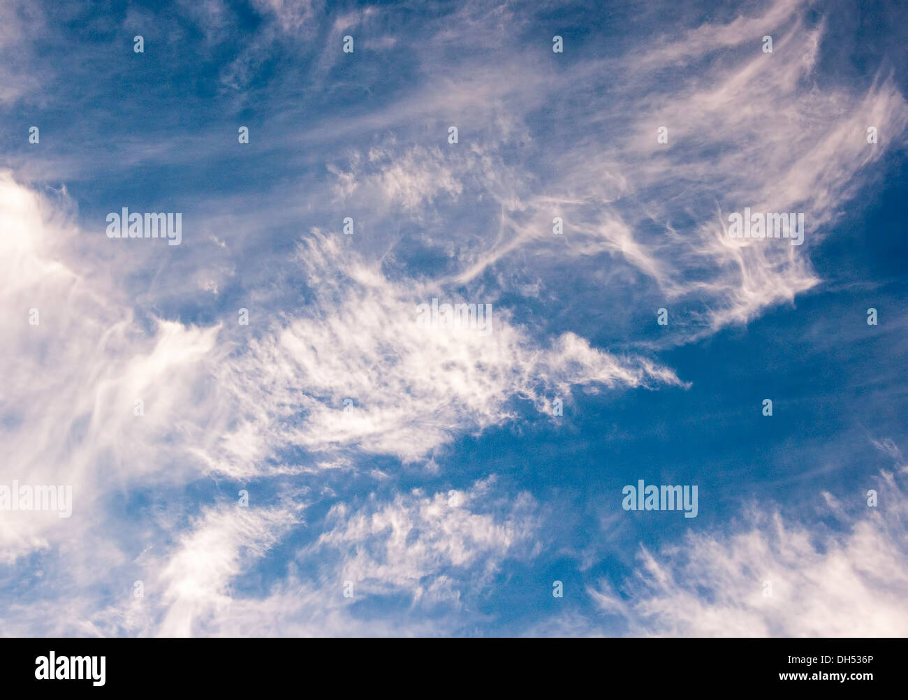 Cloudscape with puffy and whispy cloud patterns Stock Photo - Alamy