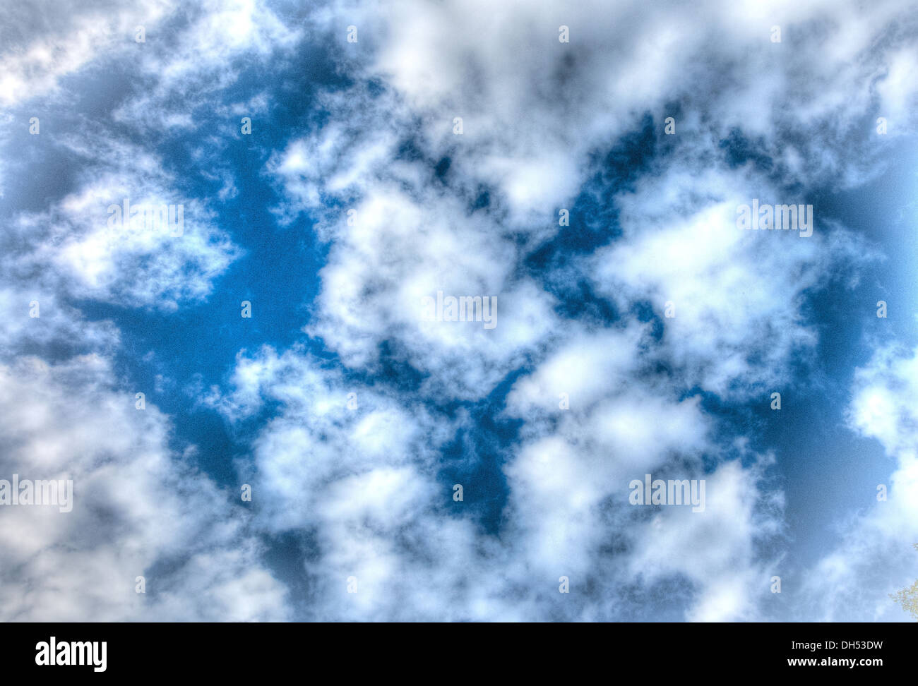 Cloudscape with puffy and whispy cloud patterns Stock Photo - Alamy