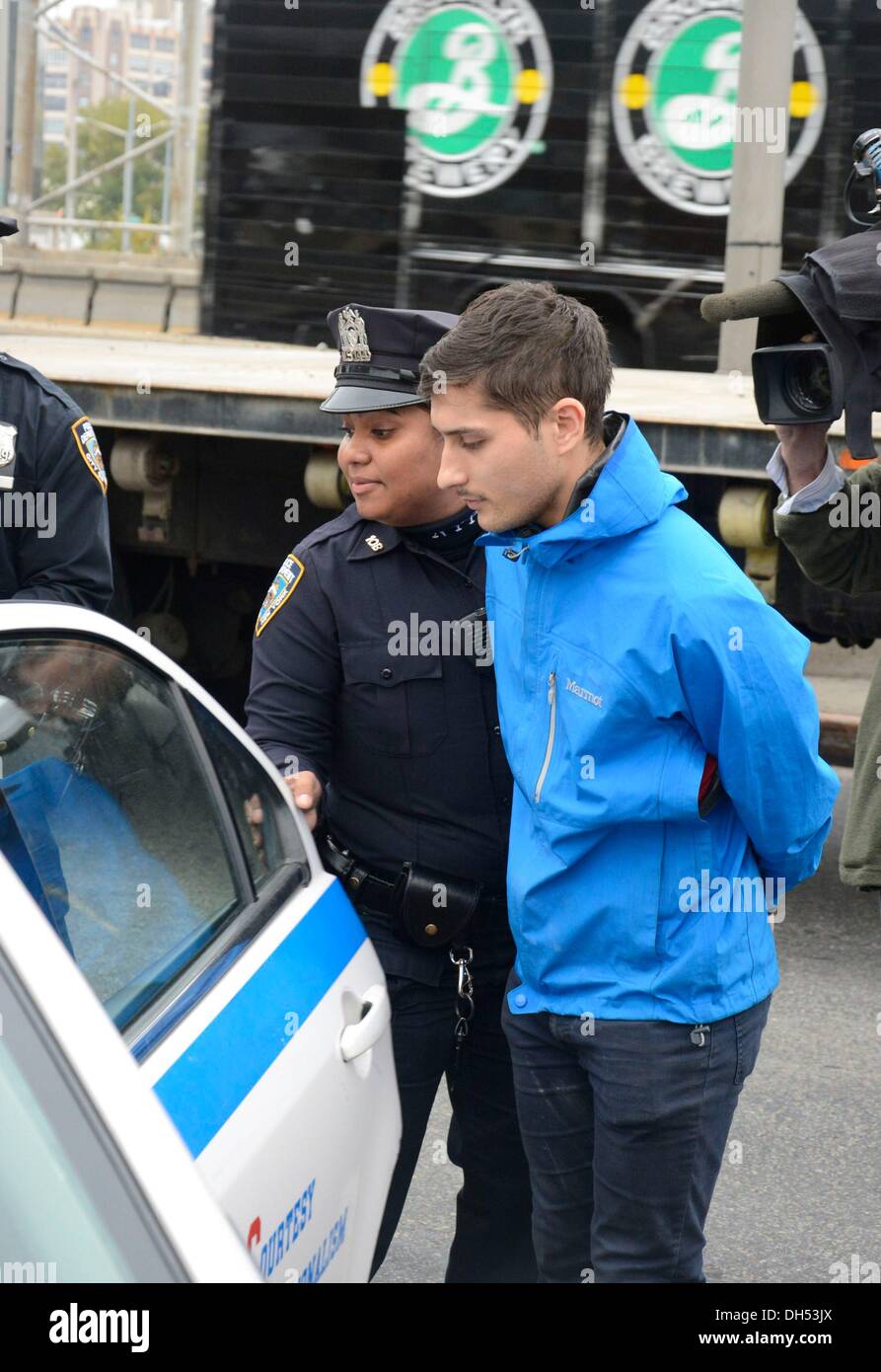 Queens, New York, USA. 31st October 2013. Police arrest suspects who ...