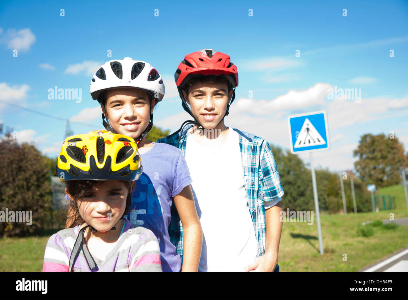 Children wearing bike helmets at a traffic awareness course Stock Photo ...