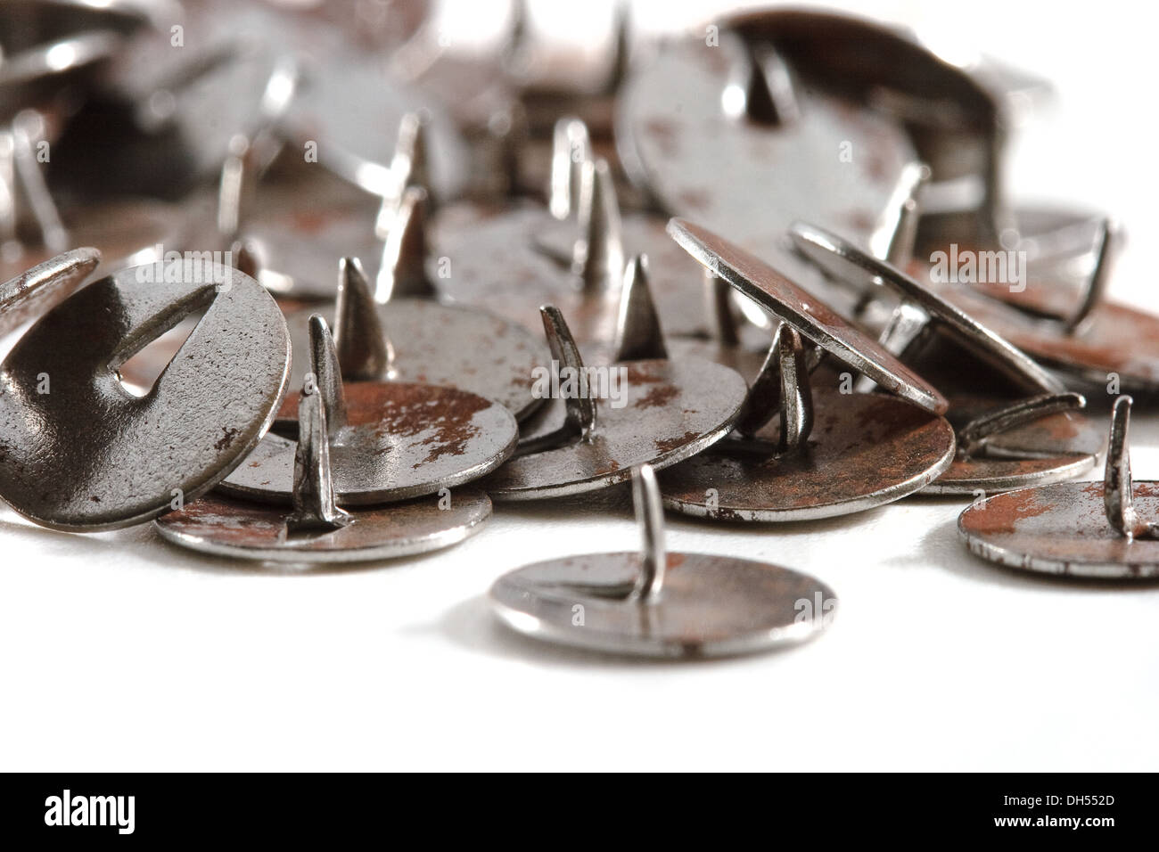 Old rusty push-pins Stock Photo - Alamy