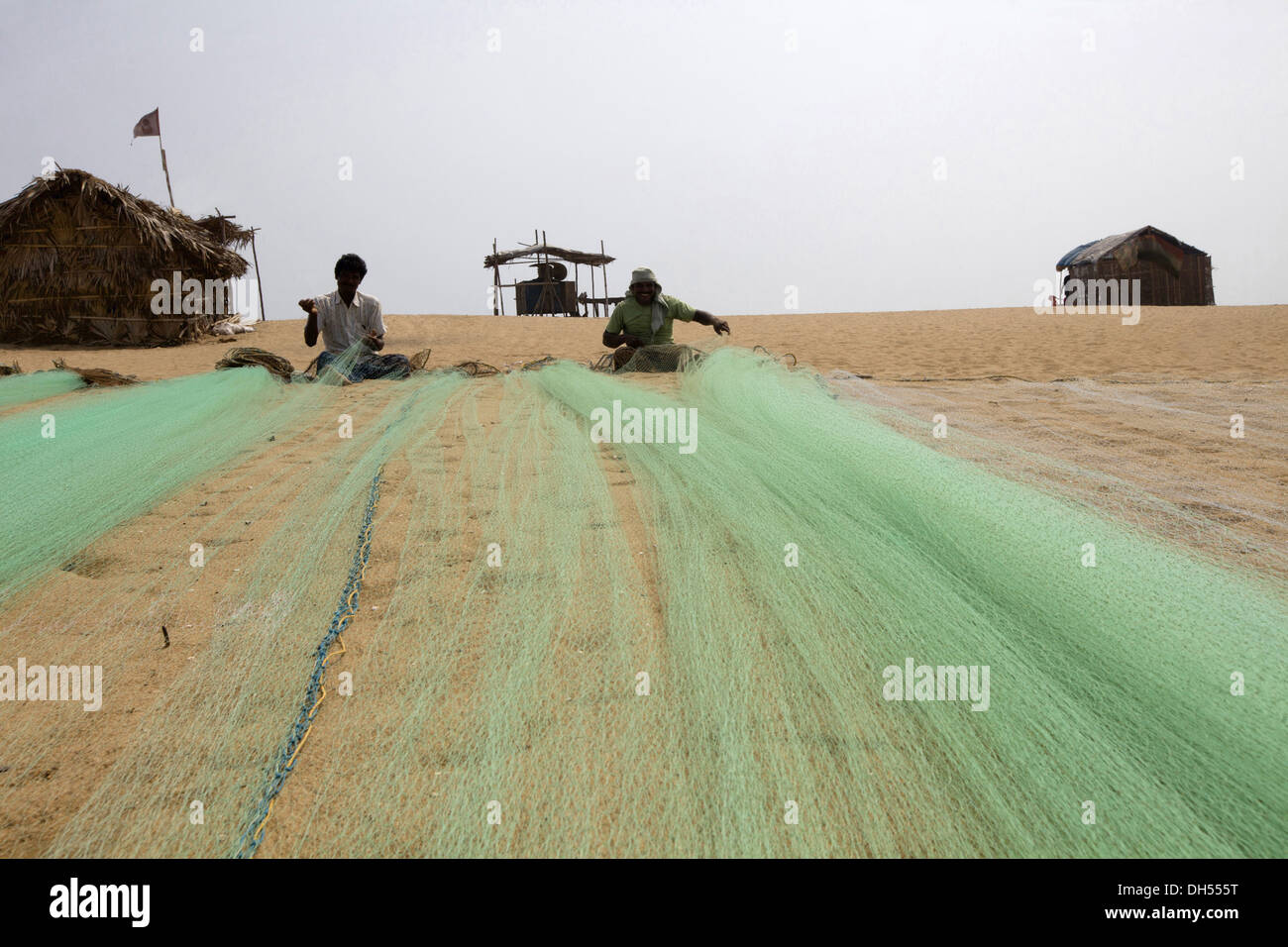 Fishermen making fishing nets, Orissa, India Stock Photo - Alamy