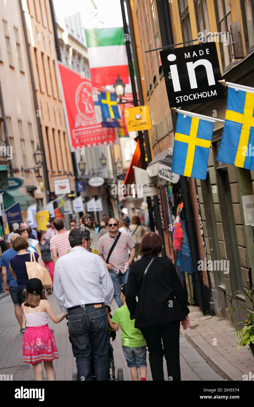 Swedish flag vasterlanggatan gamla stan hi-res stock photography and ...