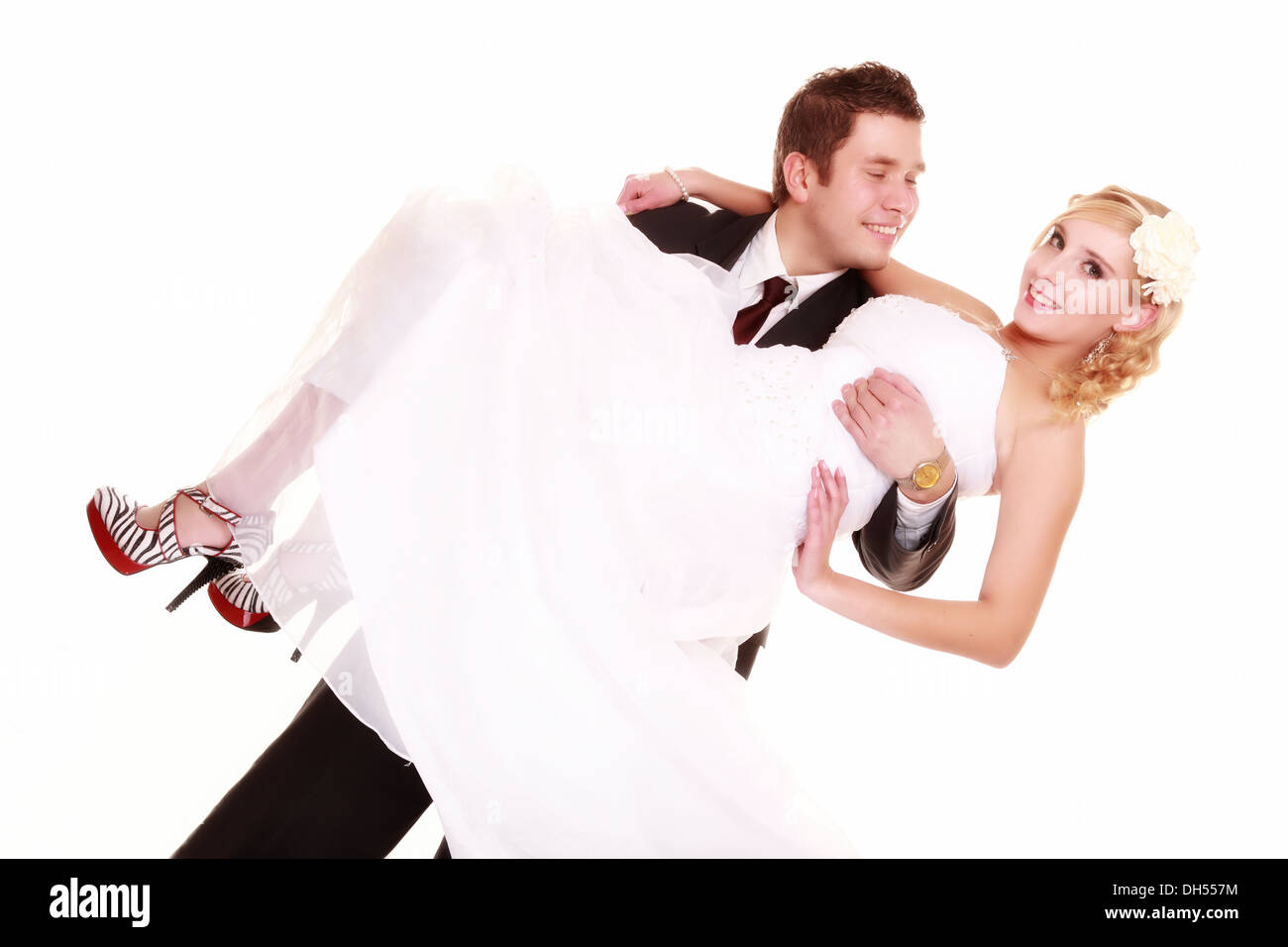 Portrait of happy bride and groom on white background Stock Photo - Alamy