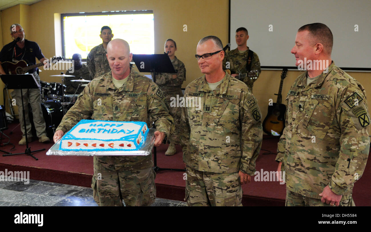U.S. Army Command Sgt. Maj. Joseph Singerhouse (left), senior enlised ...