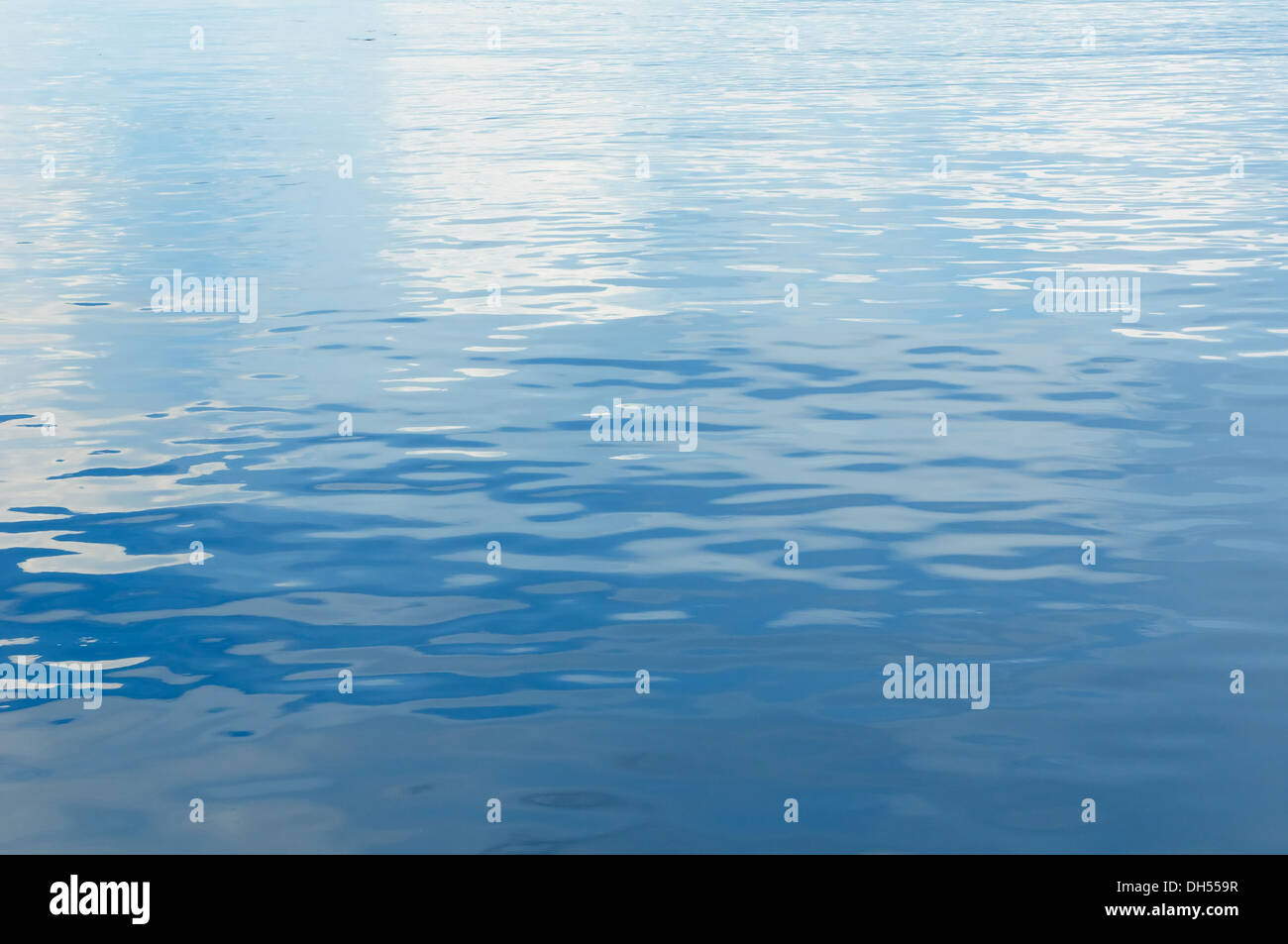 background of blue rippled water Stock Photo - Alamy