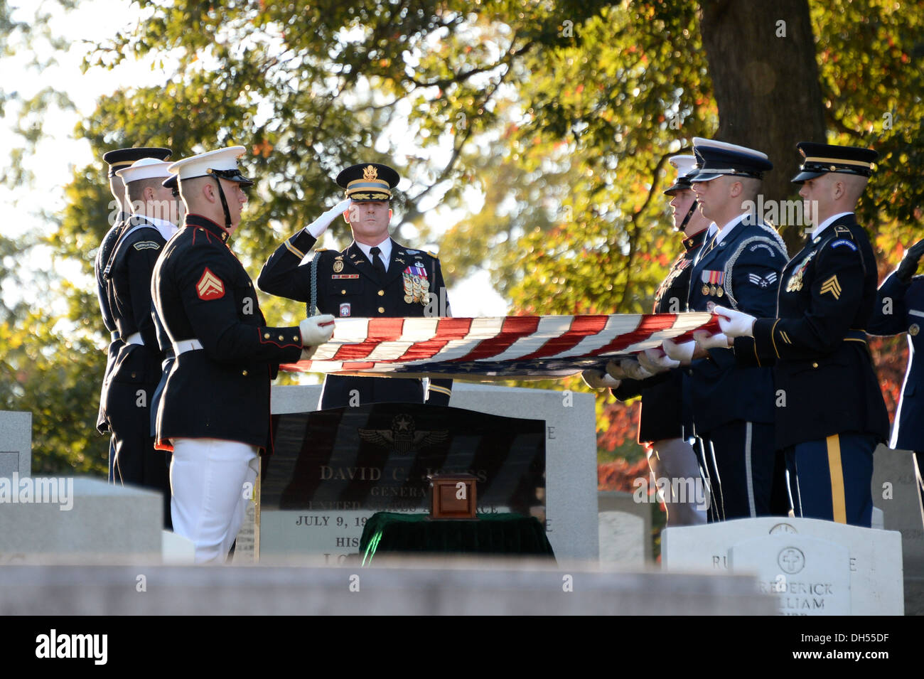 U.S. Service members of the Honor Guard participate in the funeral of ...
