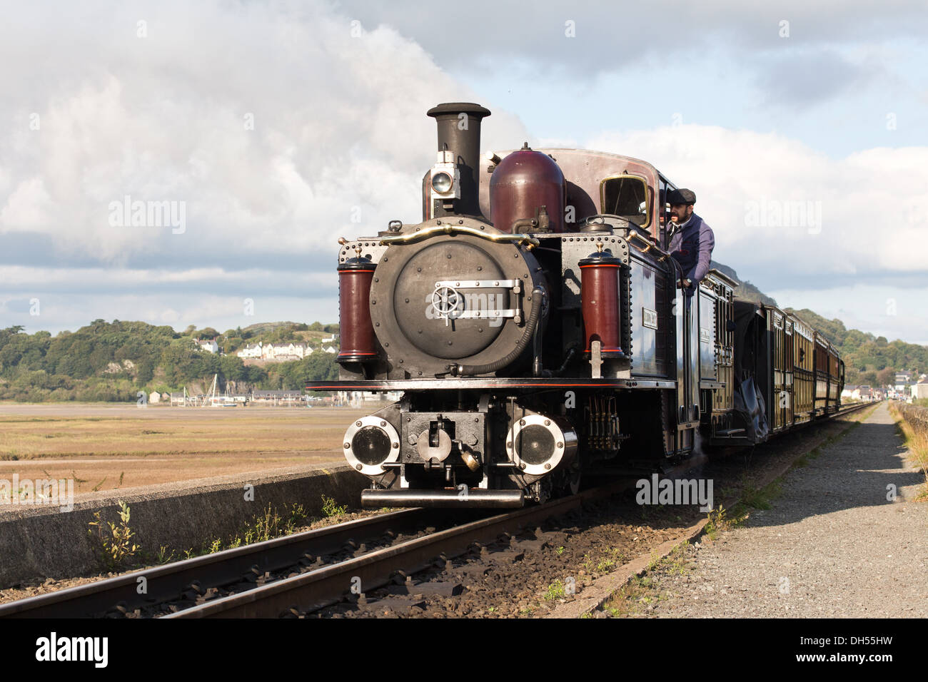 steam locomotive with a passenger train on the Blaenau Ffestiniog Railway, at Porthmadog, Wales ...