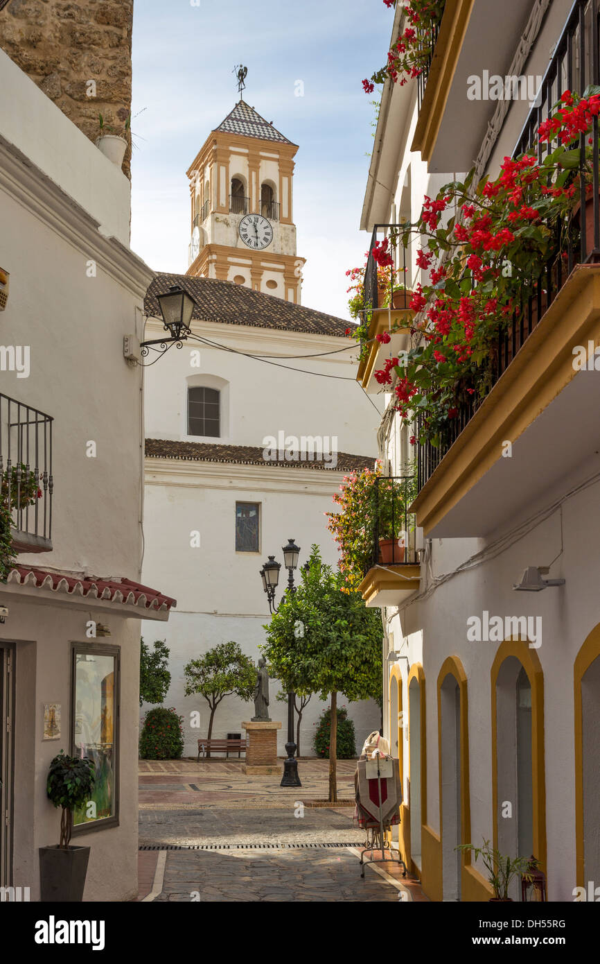 STREET SCENE WITH Church of Santa María de la Encarnación IN MARBELLA ...