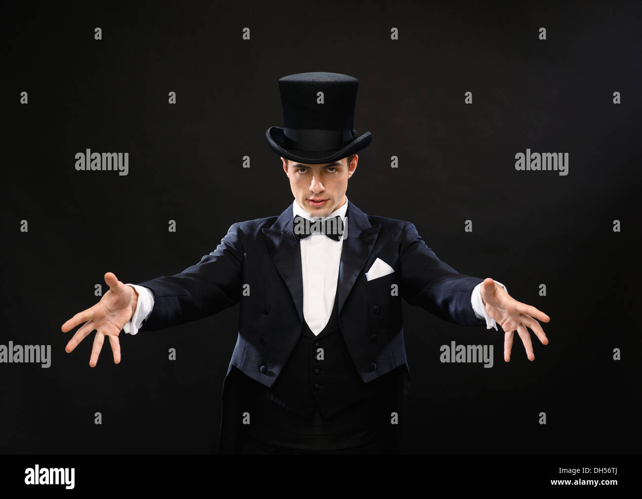 magician in top hat showing trick Stock Photo - Alamy