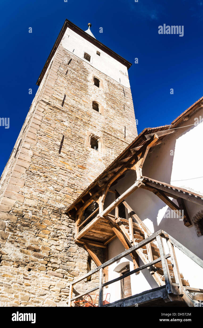 Dungeon tower of Mosna fortified church, Romania. Mosna has one of the ...