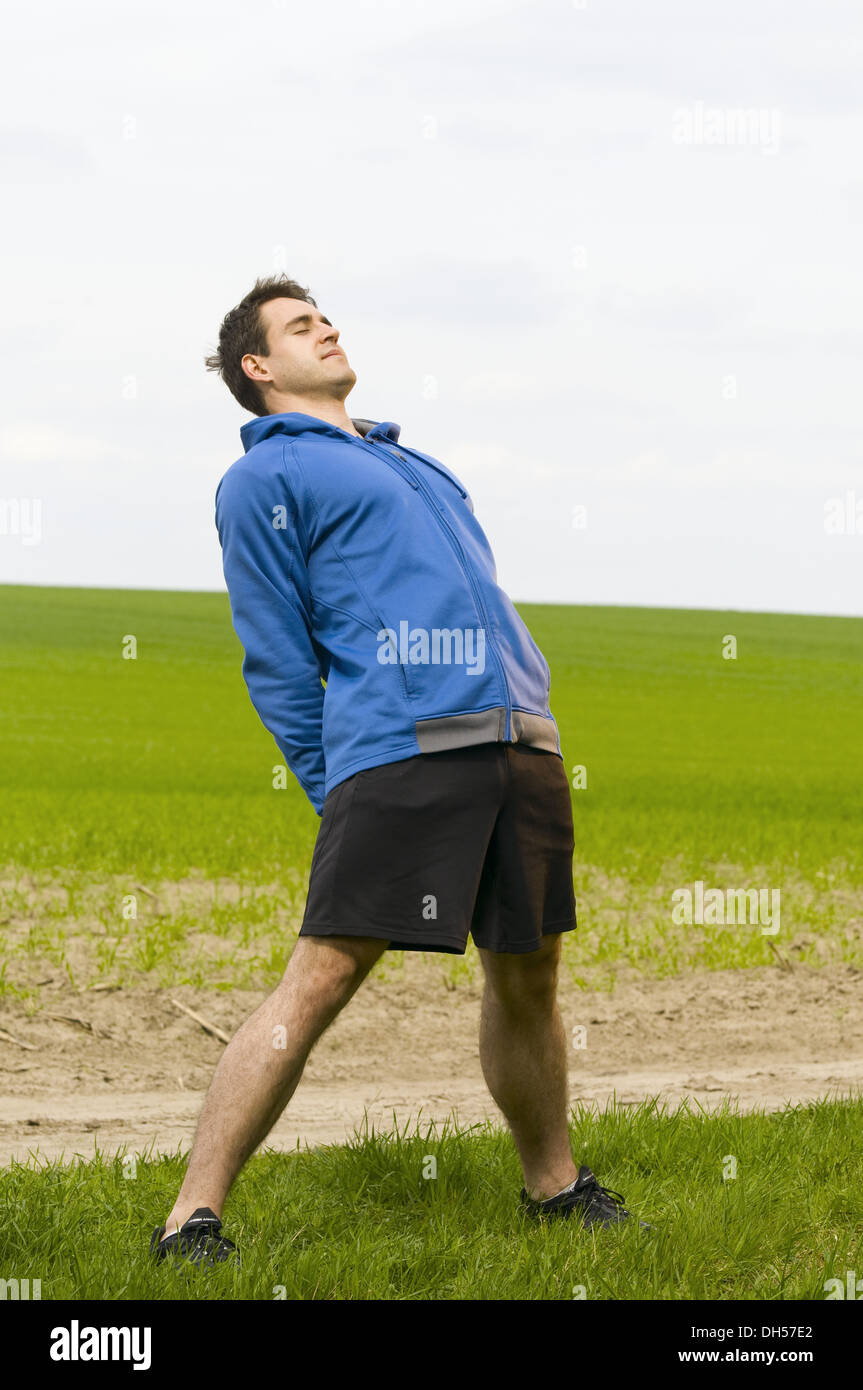 sportsman bend backward Stock Photo - Alamy