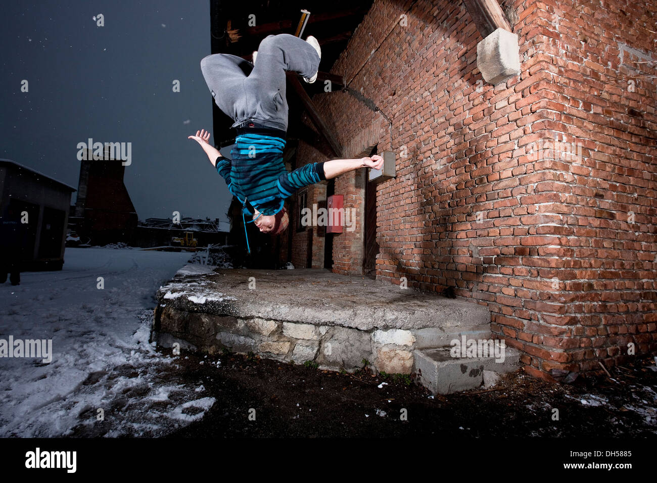 Young man freerunner doing acrobatic hi-res stock photography and ...