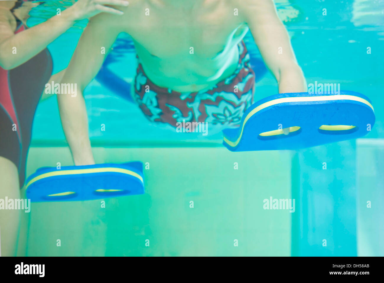 Patient and physiotherapist during underwater therapy Stock Photo - Alamy