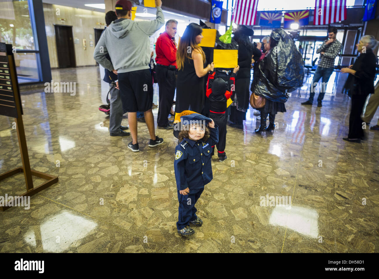 Phoenix, AZ, USA. 31st Oct, 2013. A child wearing the Halloween costume ...