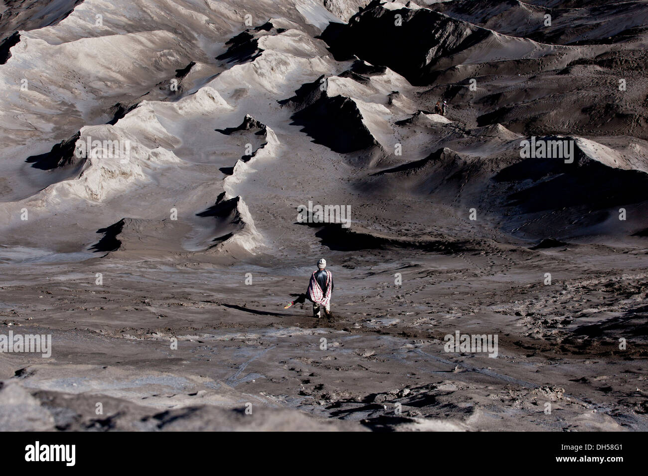 Man bringing a sacrificial offering to Mount Bromo volcano, Bromo ...