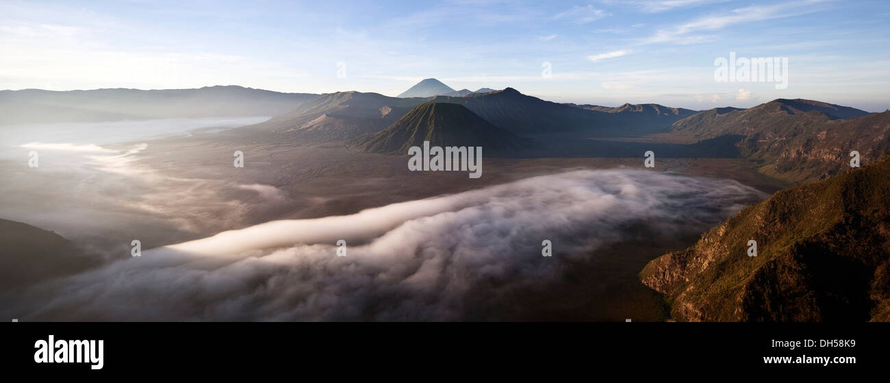 Morning fog in the Tengger Caldera with Mount Bromo volcano, mid-left ...
