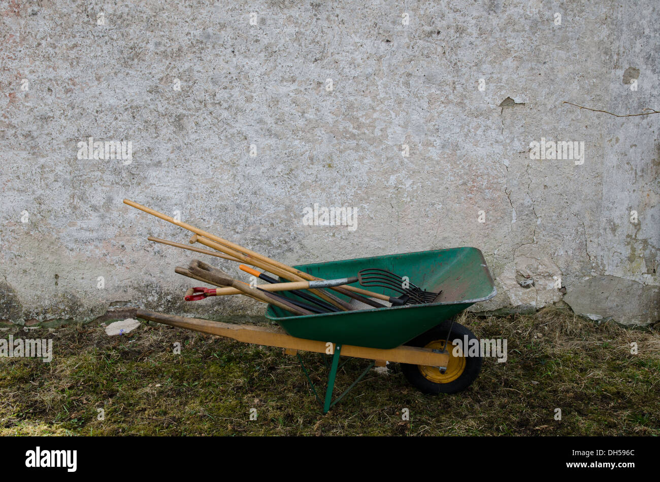 Tools in a wheelbarrow Stock Photo - Alamy