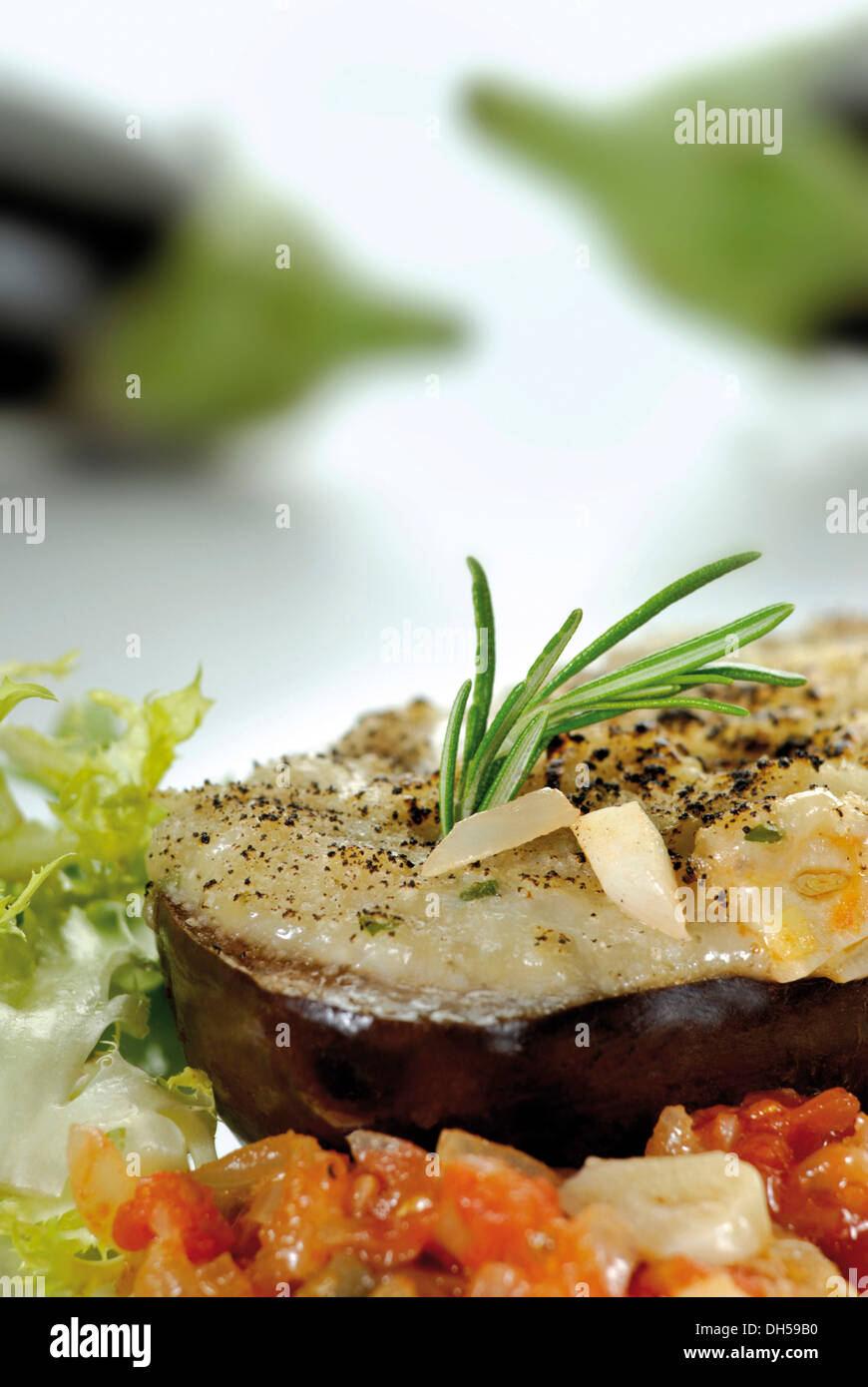 Stuffed eggplants with monkfish Stock Photo - Alamy