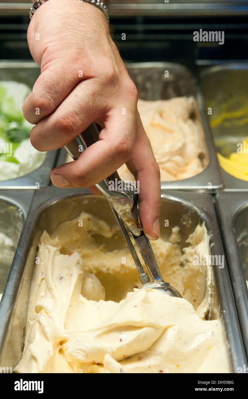 Hand Scooping Ice Cream