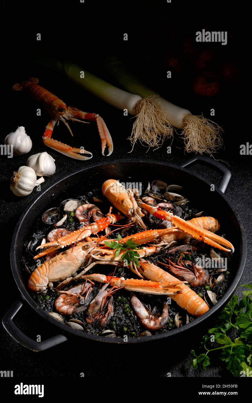Black rice with fish and seafood Stock Photo - Alamy