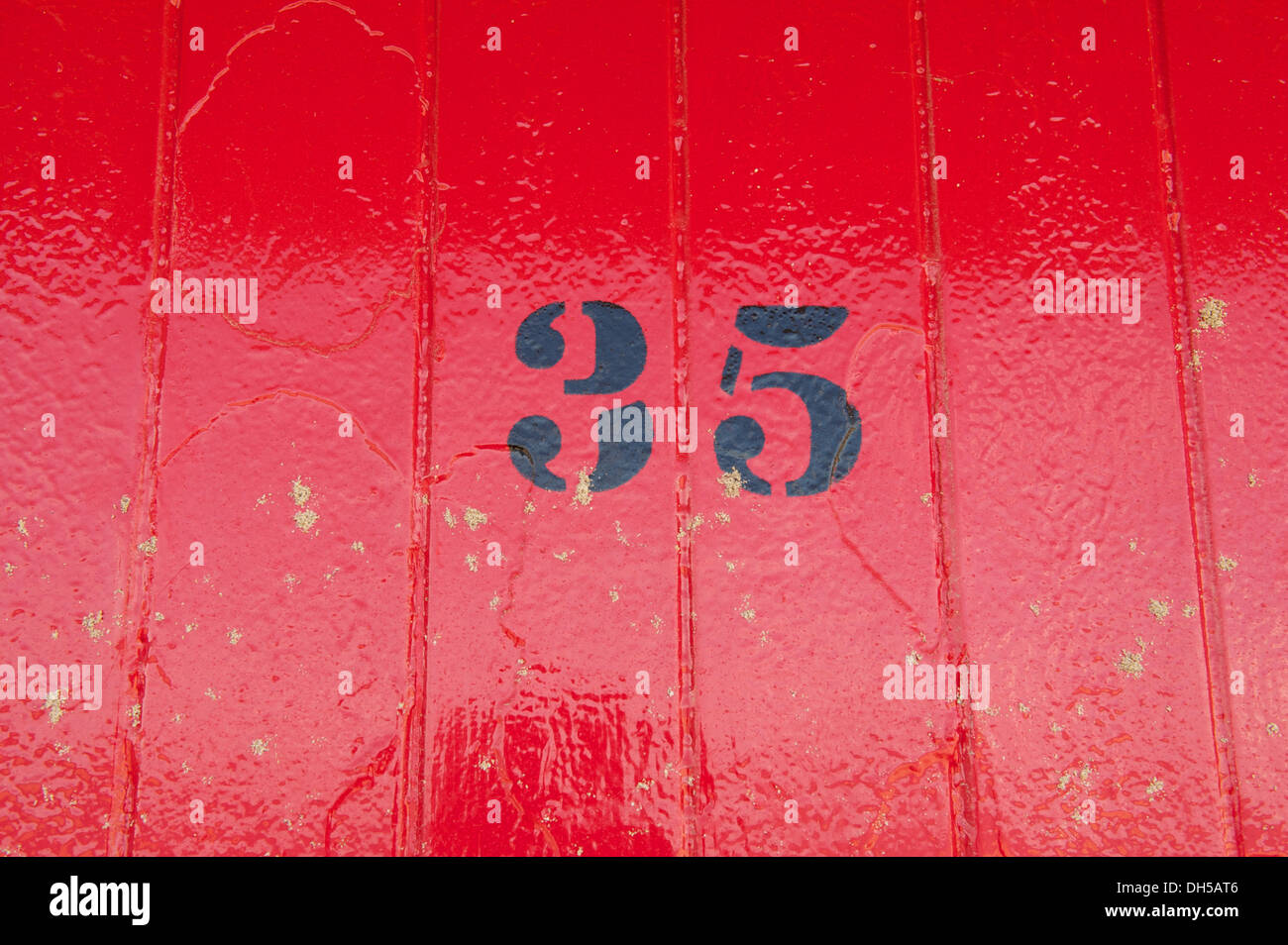 Red beach hut door with number 31 35 Stock Photo - Alamy