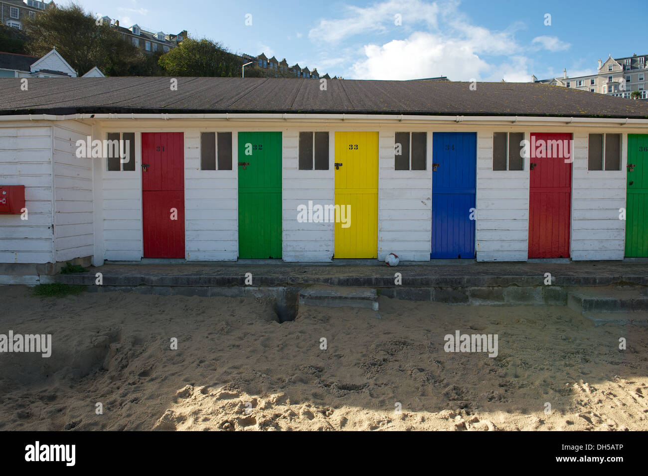 beach huts at st. ives cornwall with colourful doors colored Stock ...