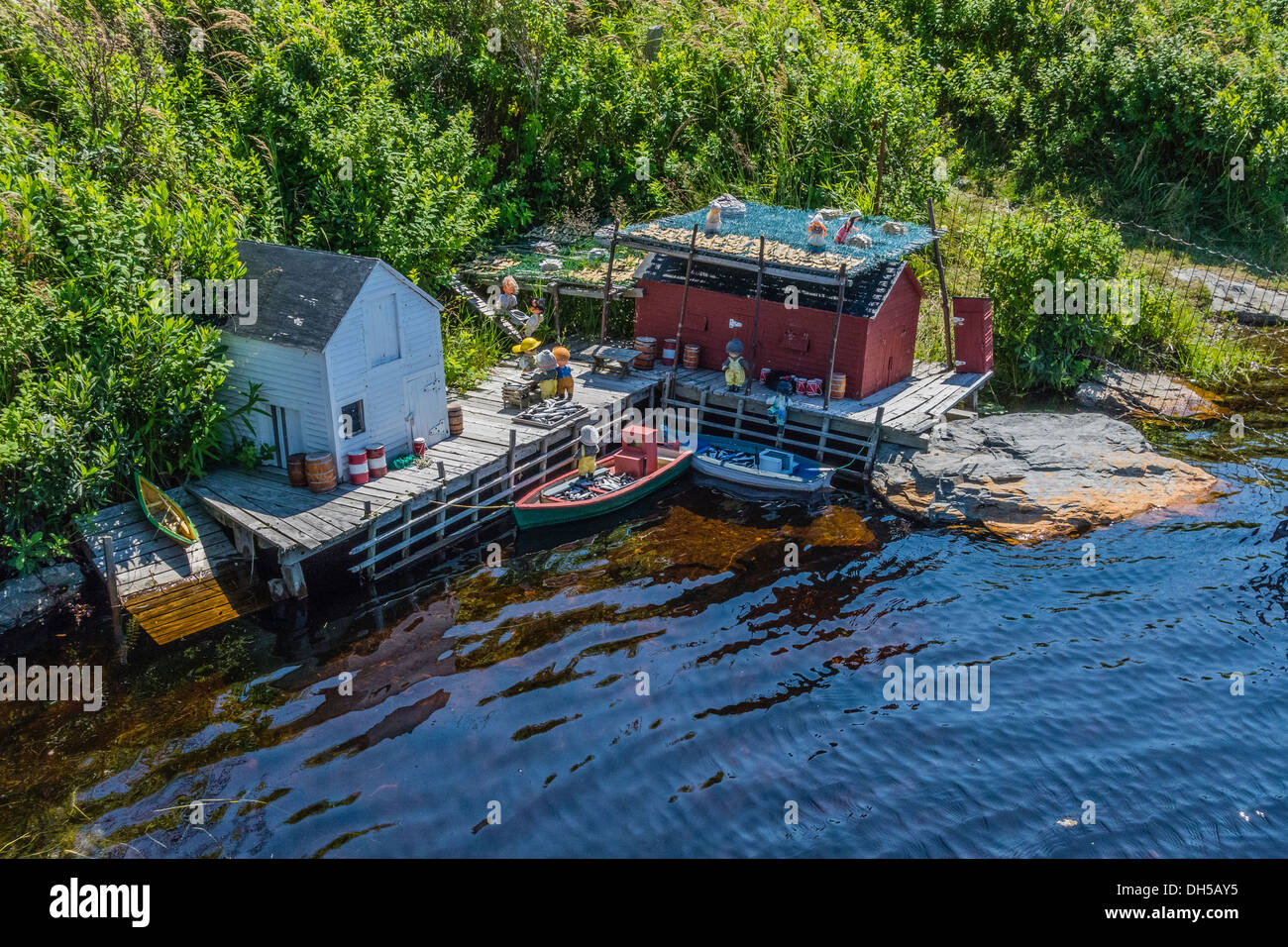 Scale model fishing building and dock at Maxwell Morgan's "River of ...