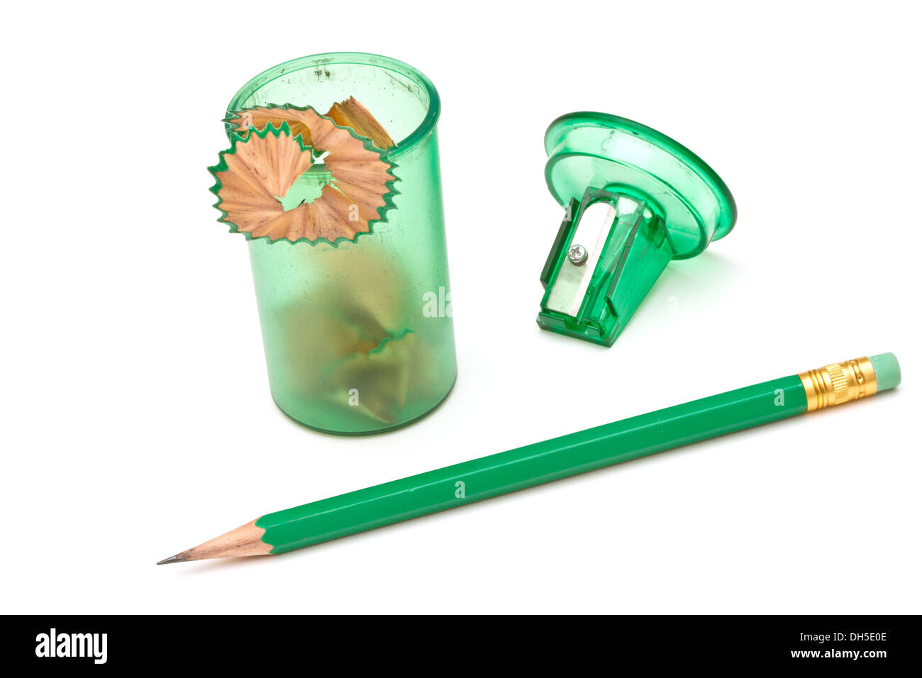 Green sharpener and pencil on white background Stock Photo - Alamy