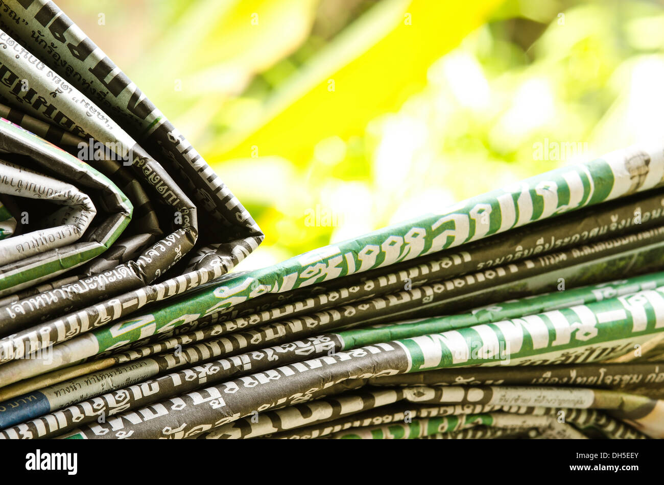 closeup pile of newspaper Stock Photo - Alamy