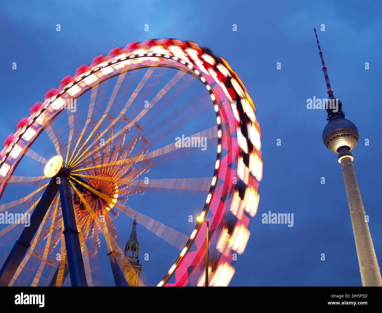 Ferris wheel and TV Tower at night, Berlin Stock Photo - Alamy