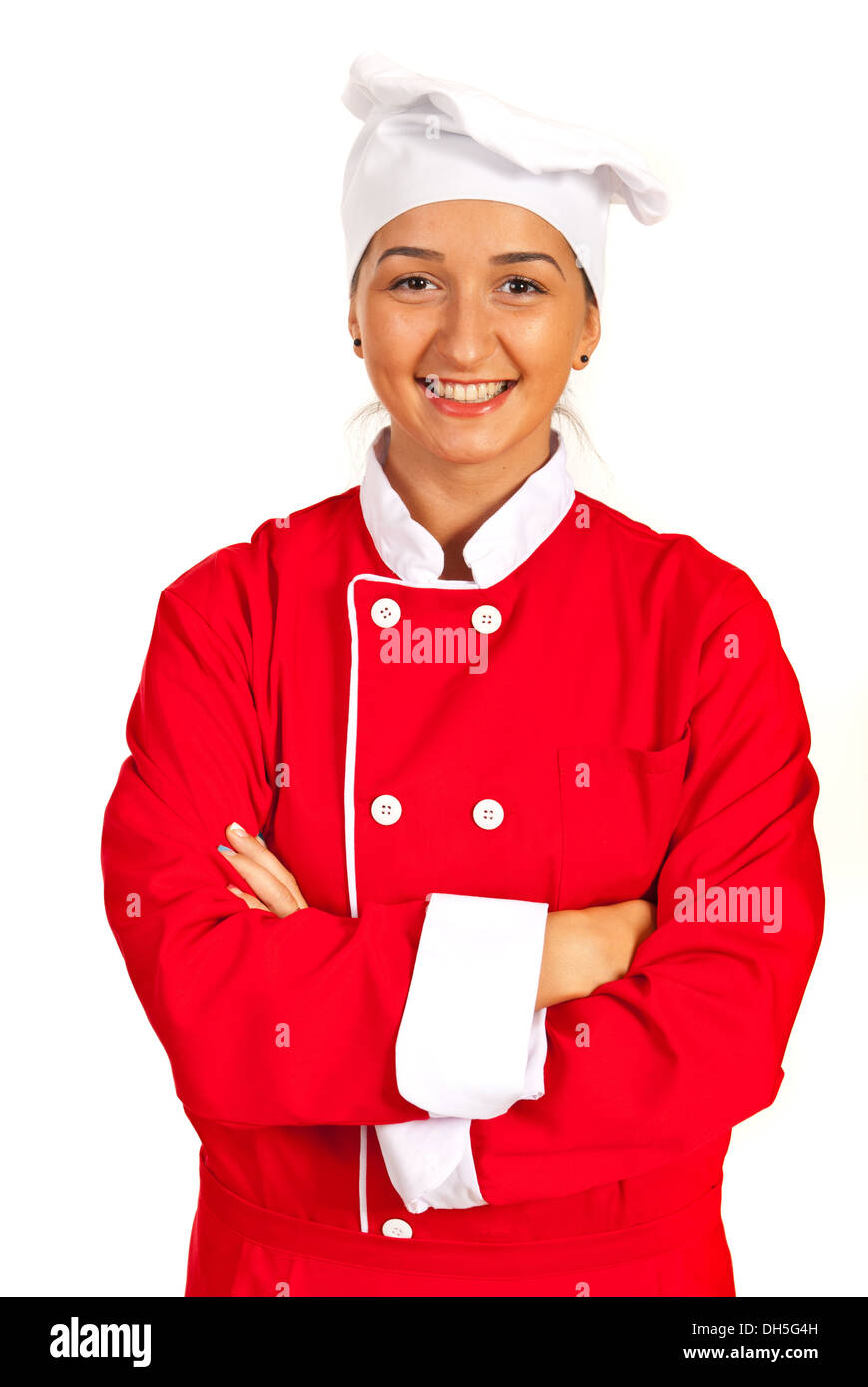 Happy chef woman standing with arms folded isolated on white background ...