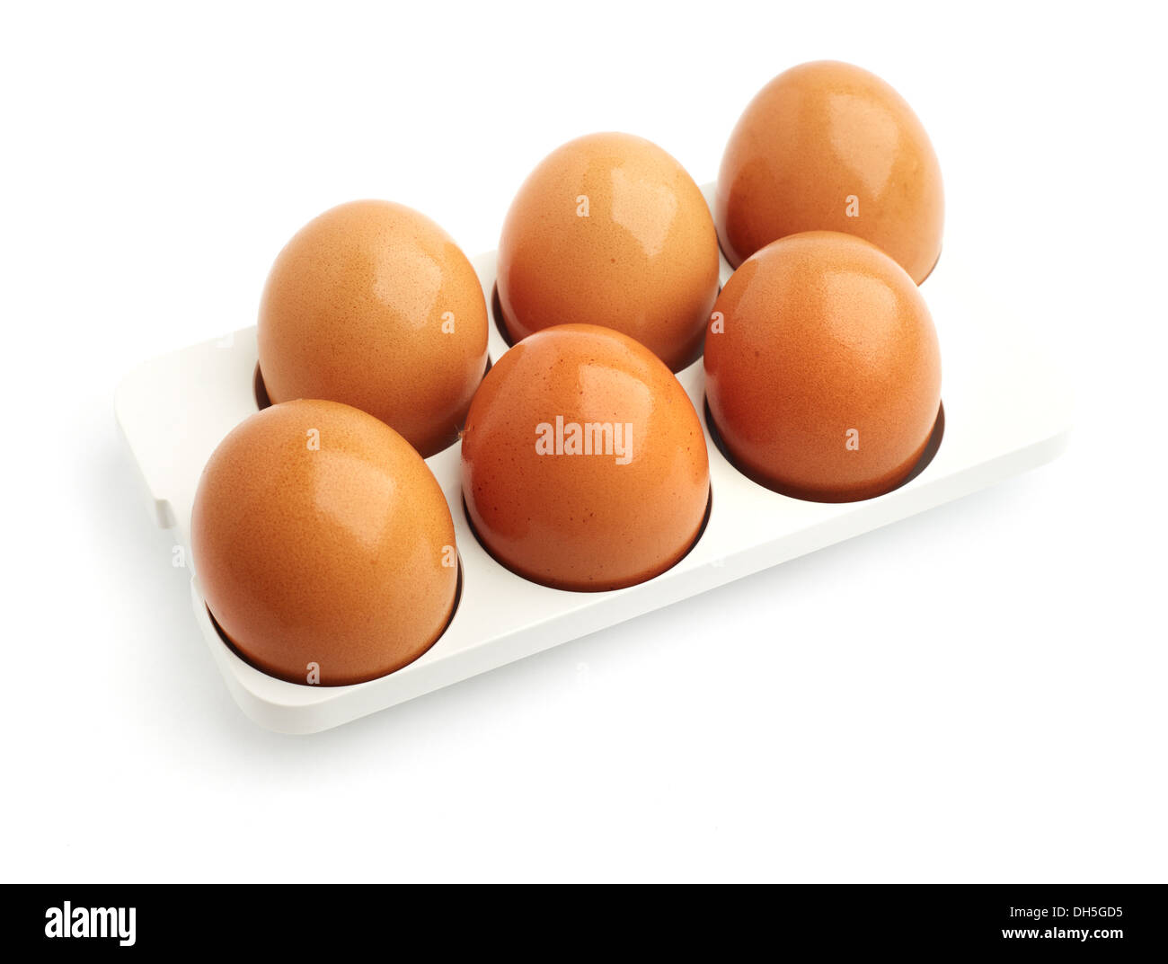 six eggs in a tray Stock Photo - Alamy