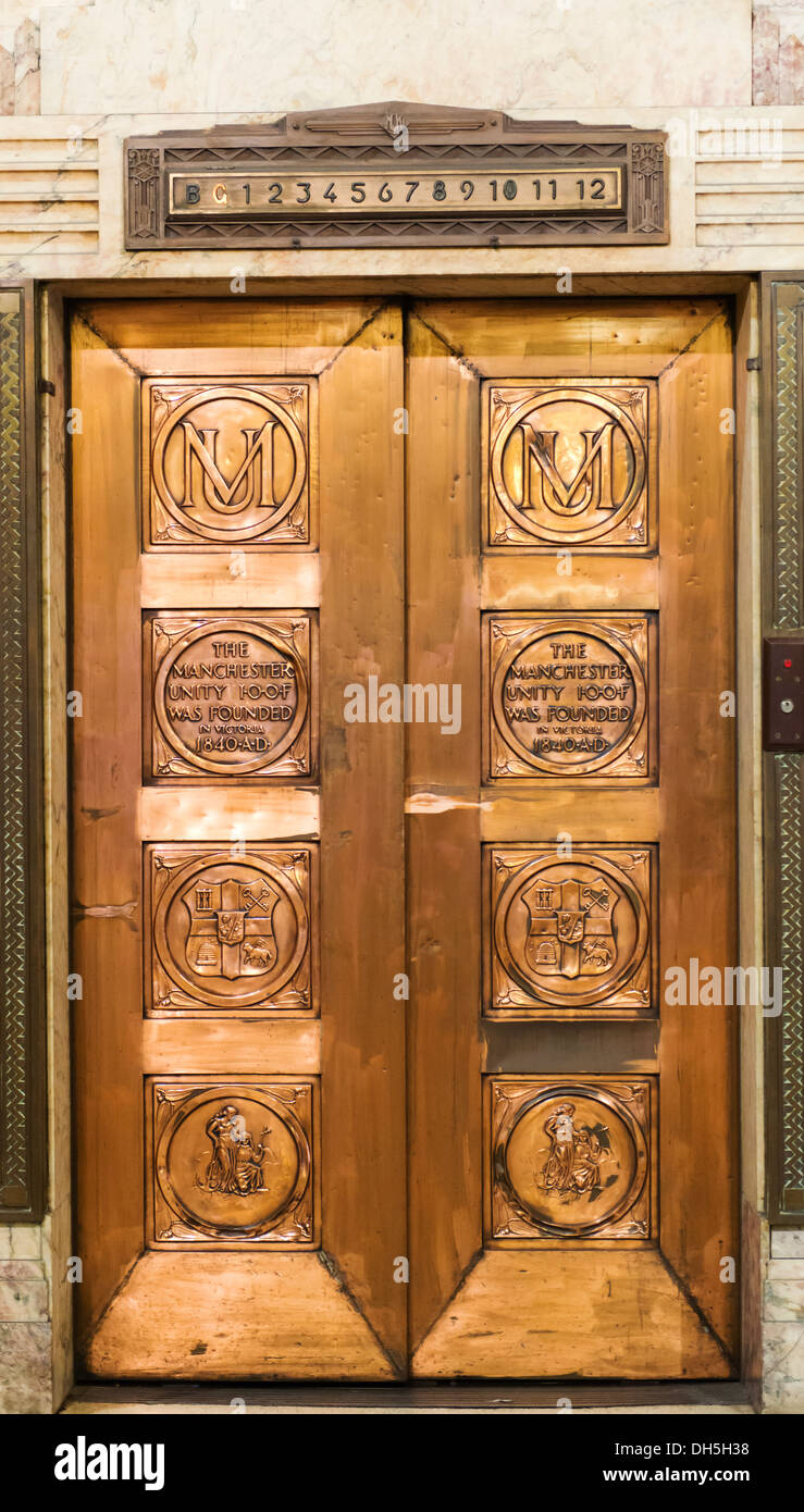 Doors to the elevator in the Manchester Unity building Stock Photo - Alamy