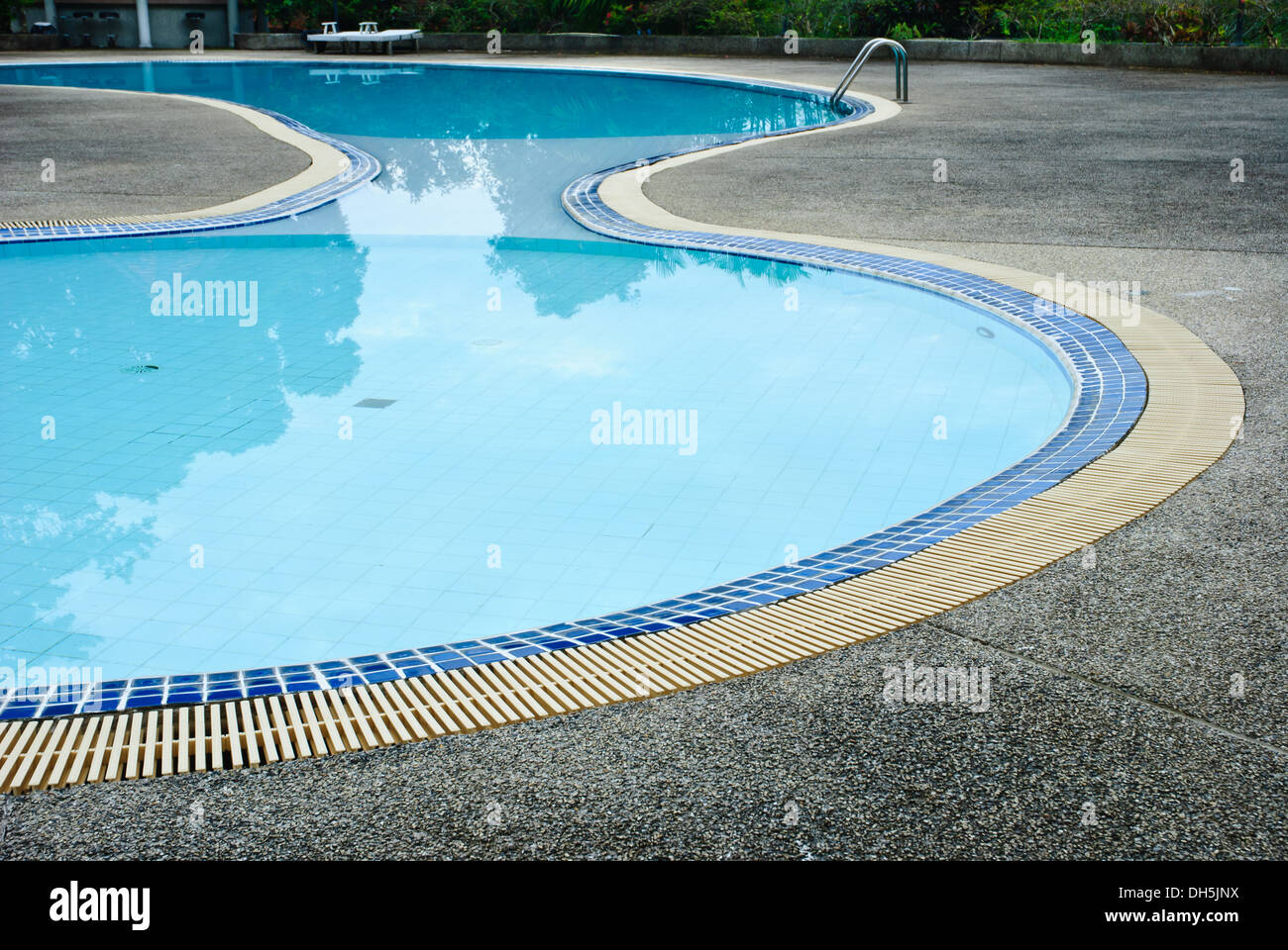 swimming pool blue transparent water, with beautiful curves concave ...
