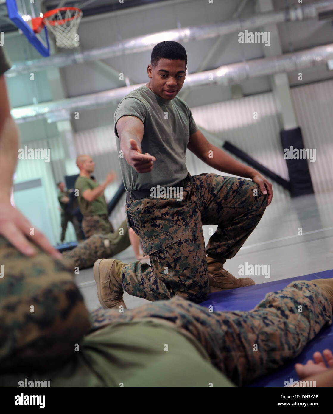 Sergeant Butch Fortner, a Marine Corps Martial Arts Program instructor ...