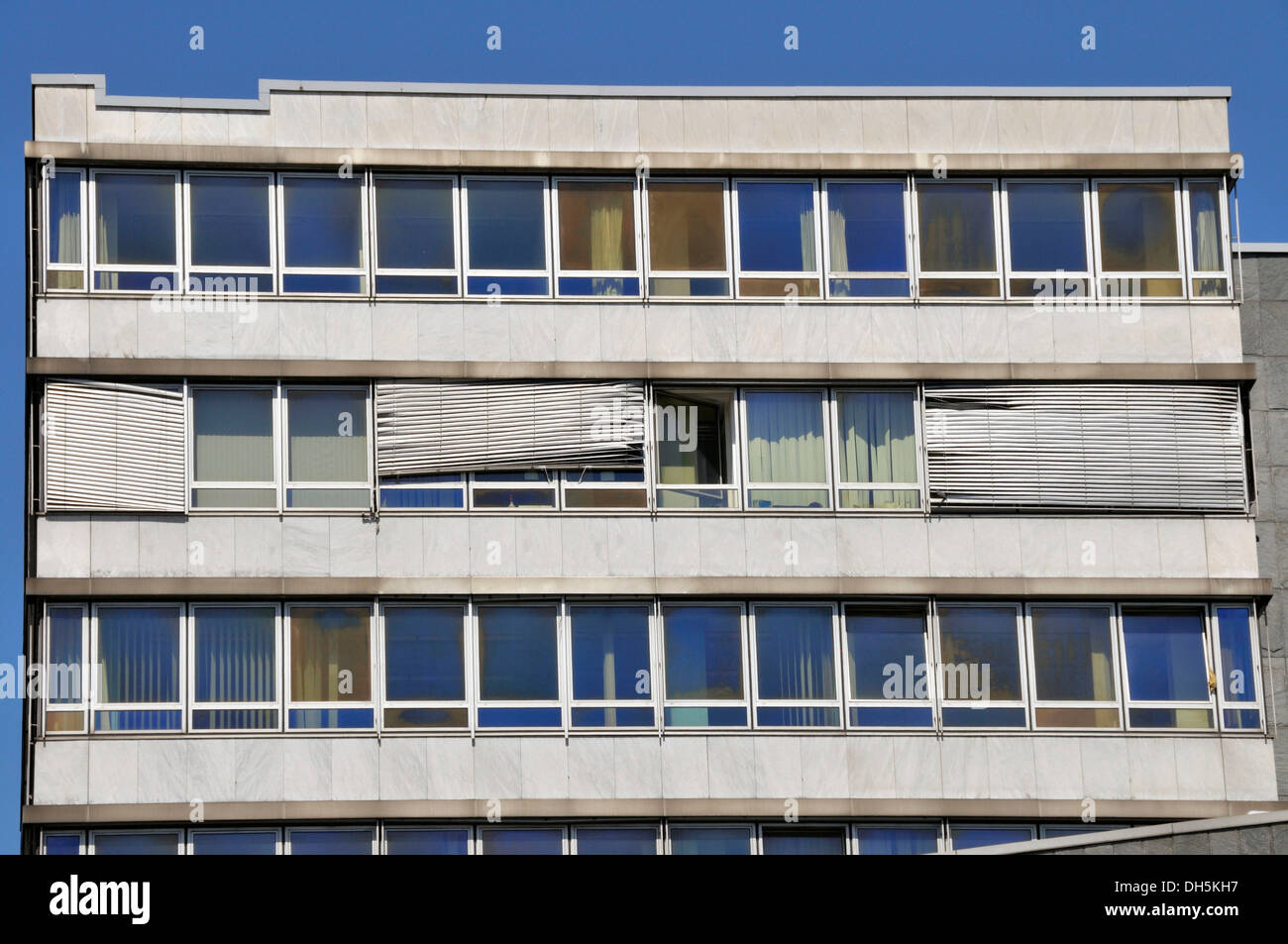 Run-down office building with broken blinds, Mainz, Rhineland ...