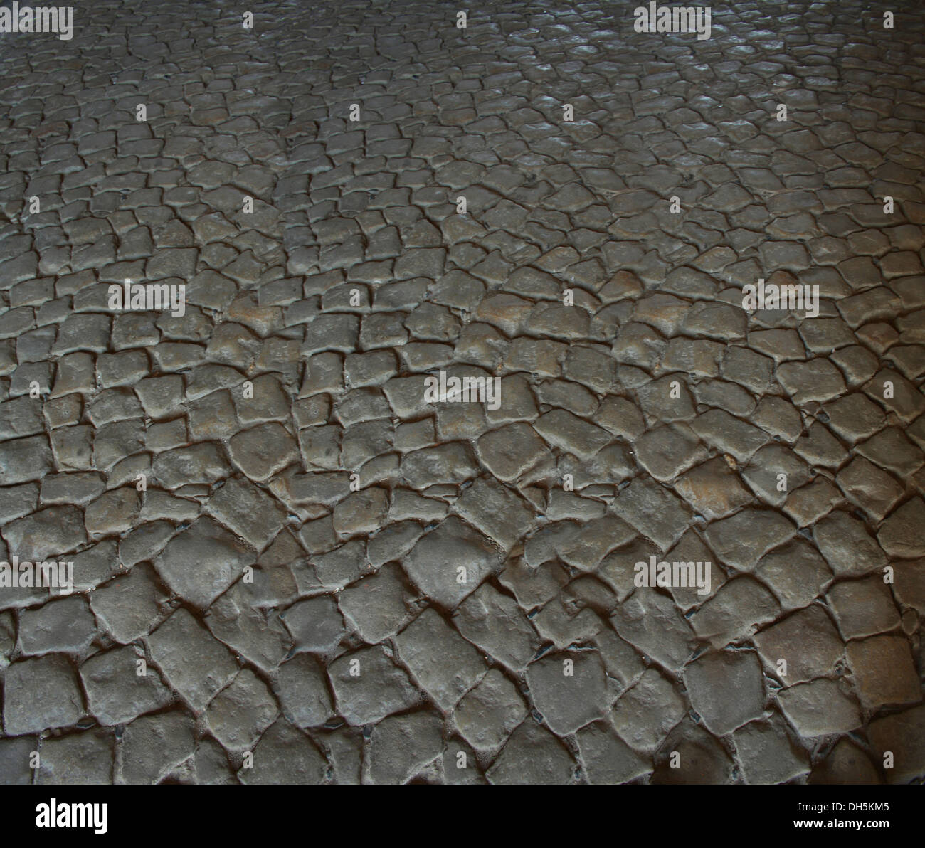 road, roadway, street of gray cobblestone, background with texture of ...