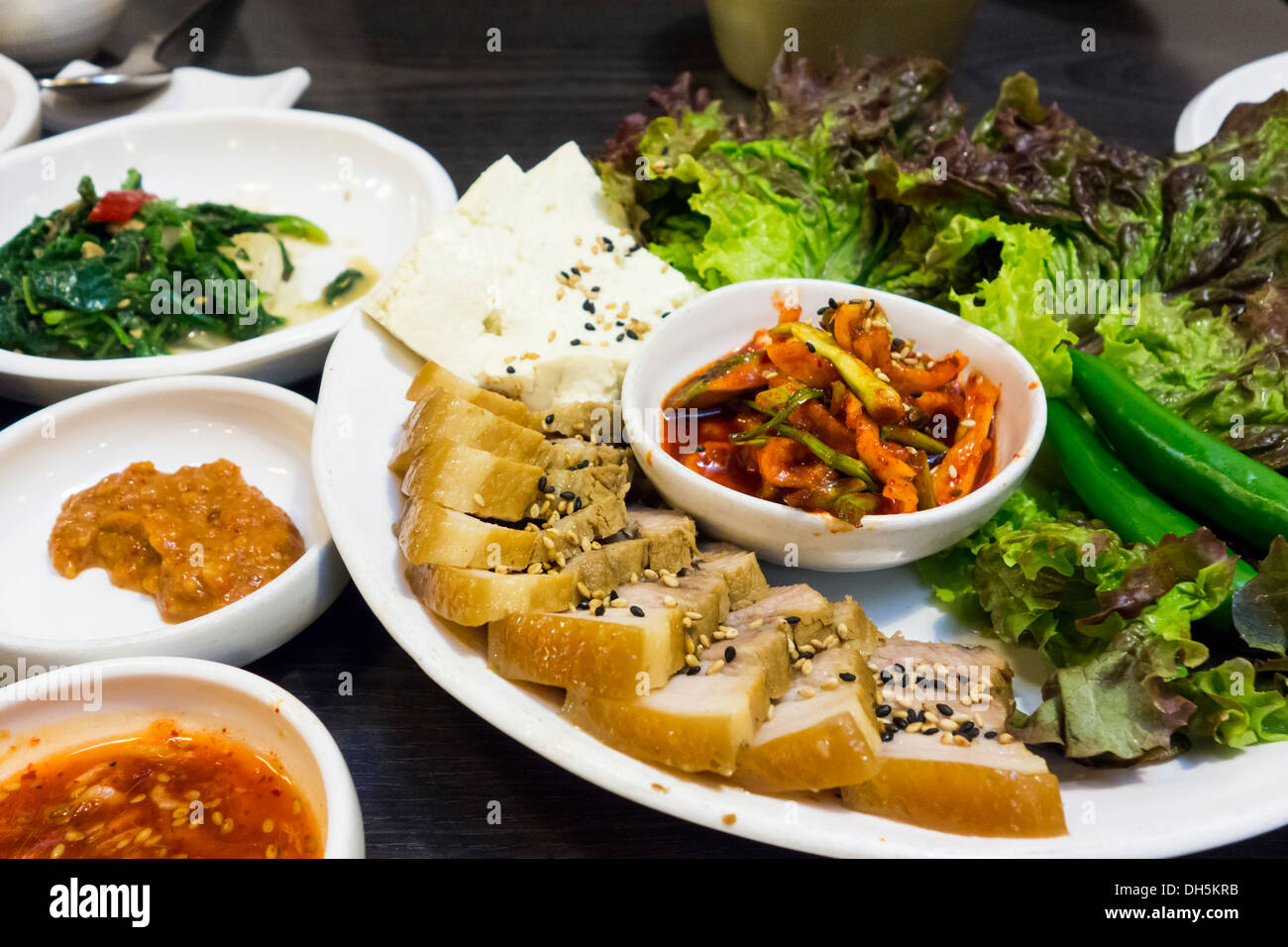 Bossam is a type of wrap in Korean cuisine Stock Photo - Alamy
