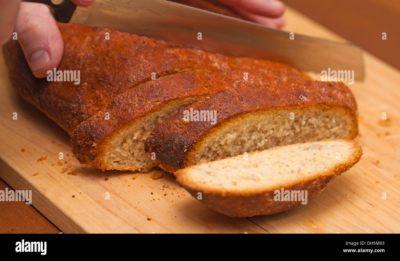 Cutting loaf fresh home made bread hi-res stock photography and images ...